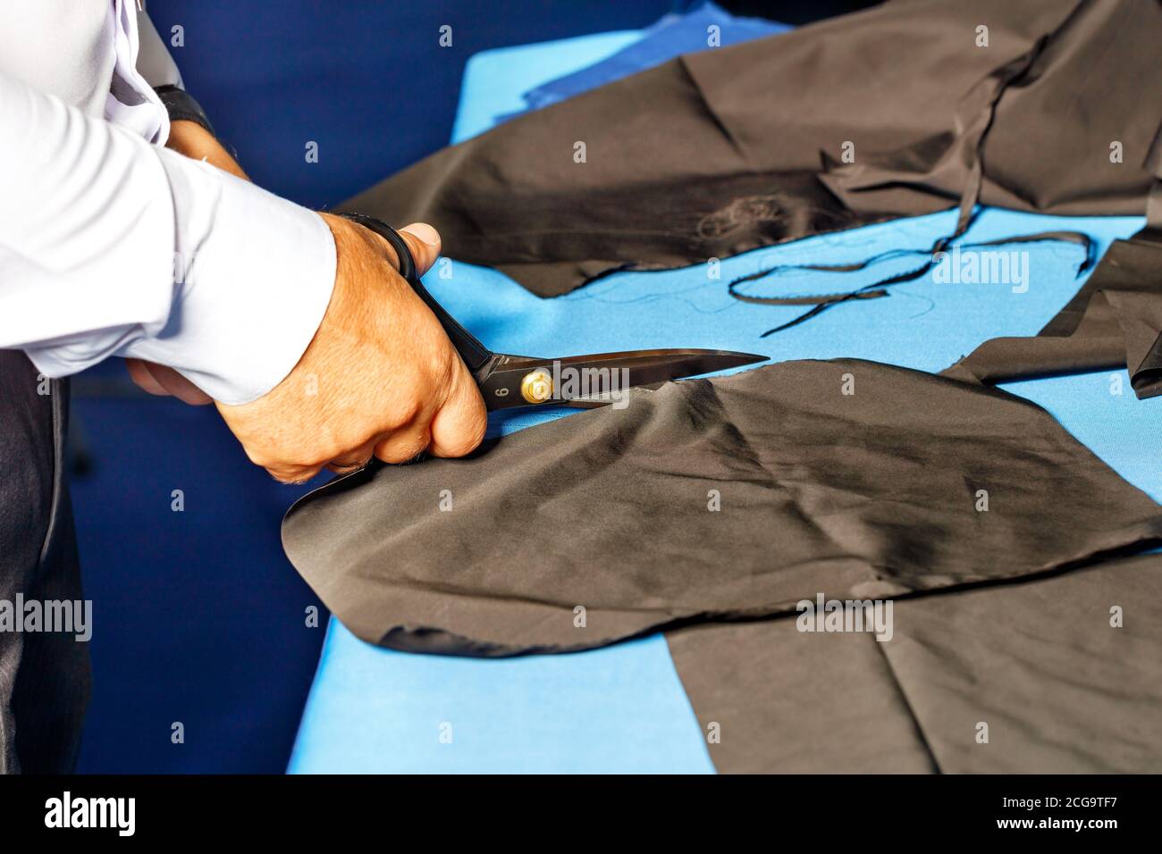 Tailor scissors suit hi-res stock photography and images - Alamy