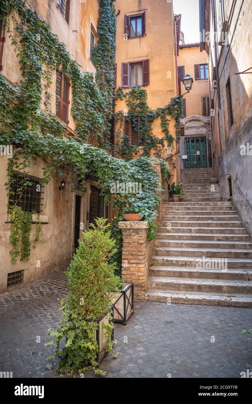 View of old cozy street, steps leading upward in Rome, Italy Stock ...