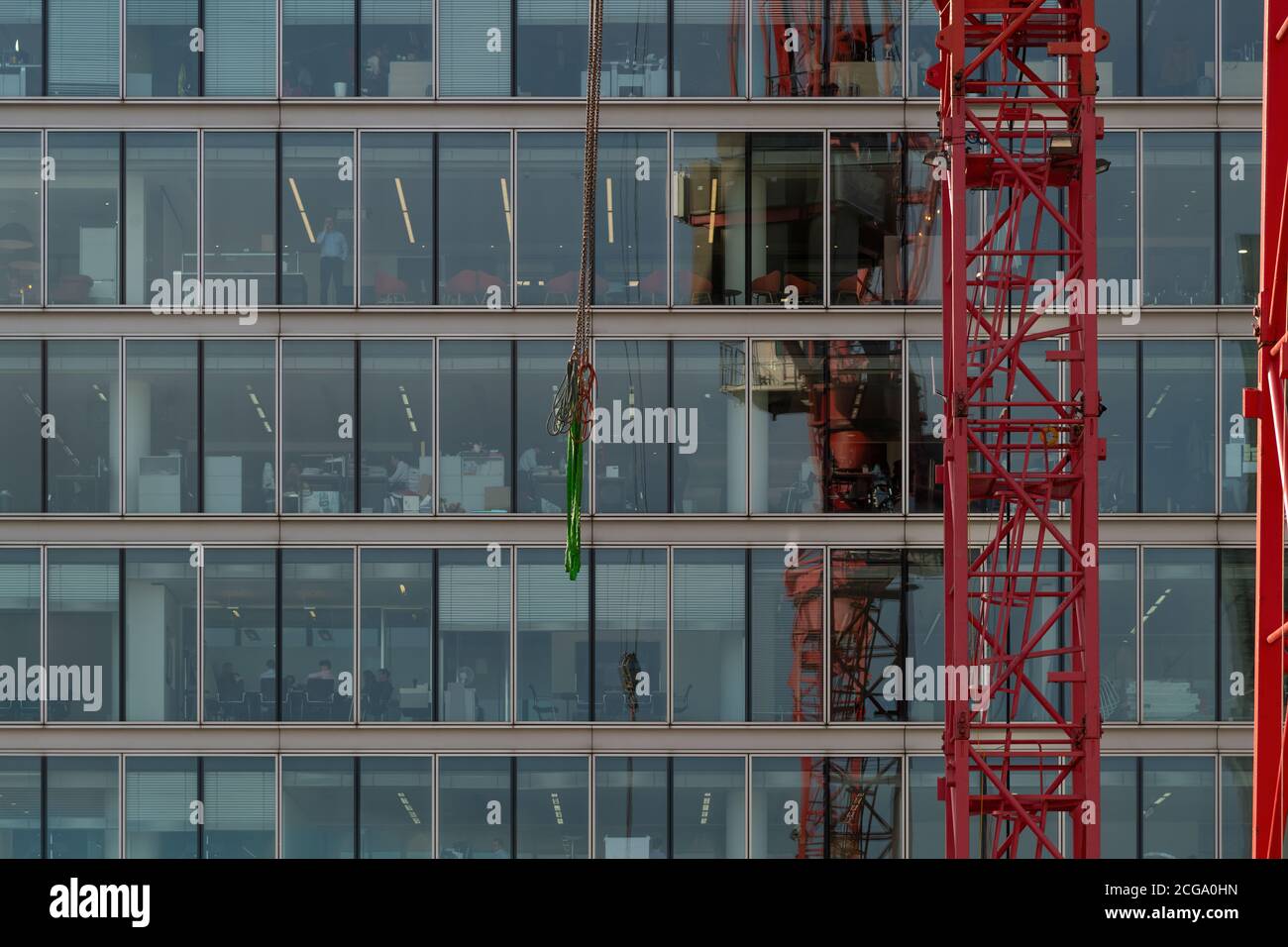 Tower cranes in front of office windows in Moorgate, London Stock Photo ...