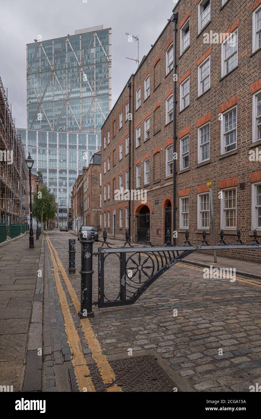 Folgate Street in Spitalfields, London with the Broadgate tower in the ...