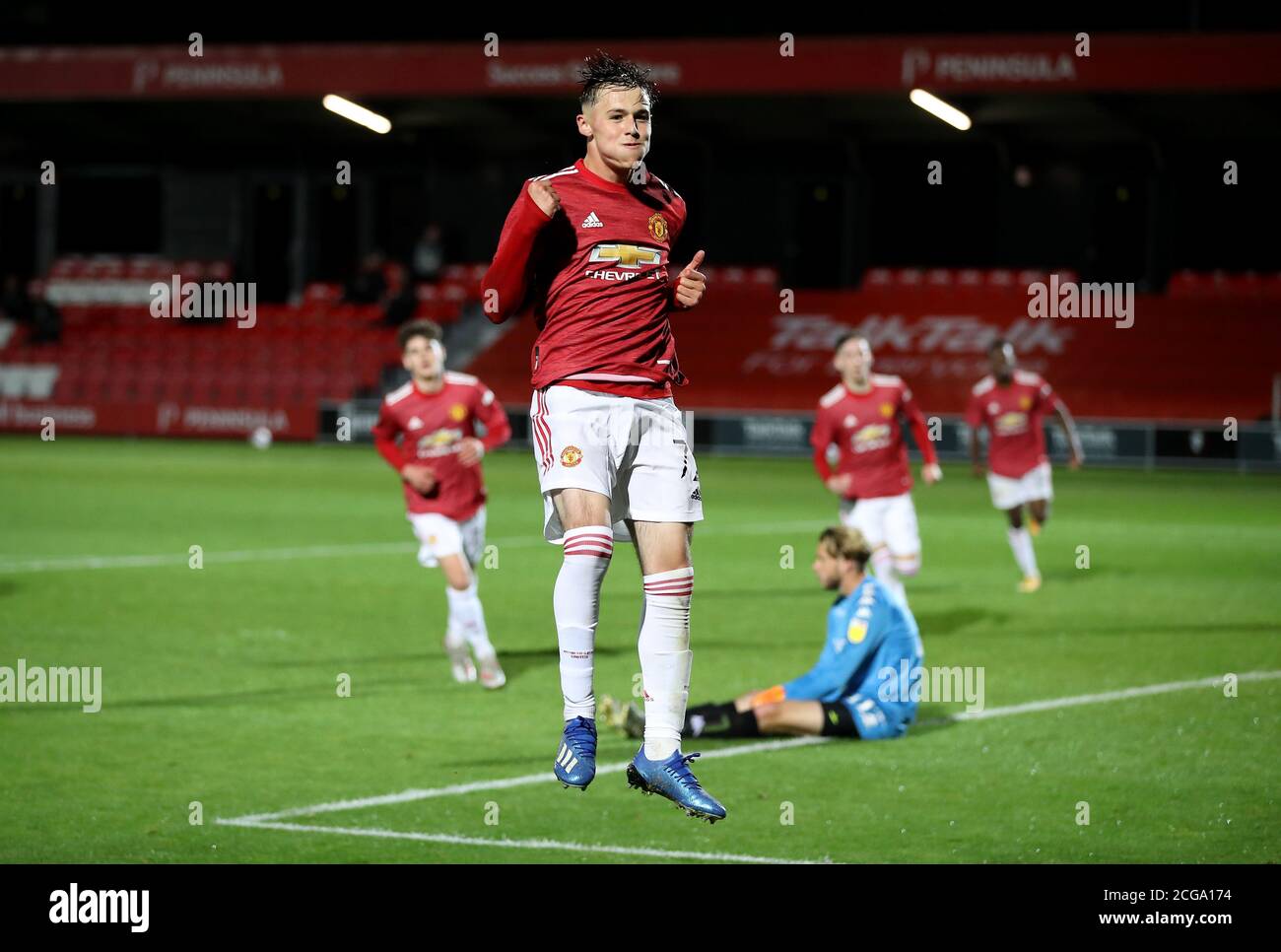 Manchester United's Mark Helm celebrates scoring his side's fifth goal ...