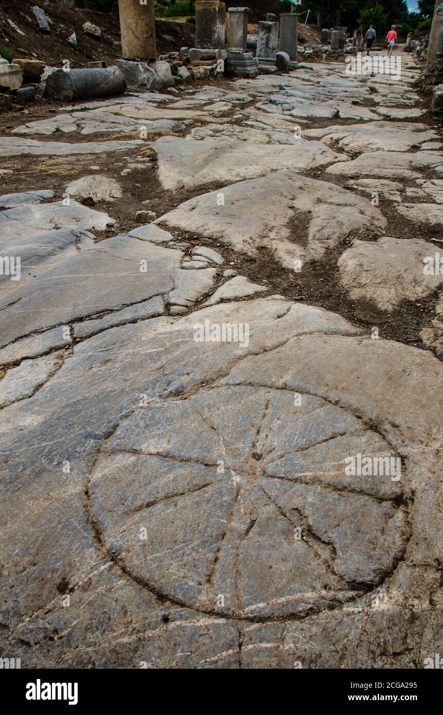 Etched in the roads Ephesus is the“Christian wheel”which is believed to ...
