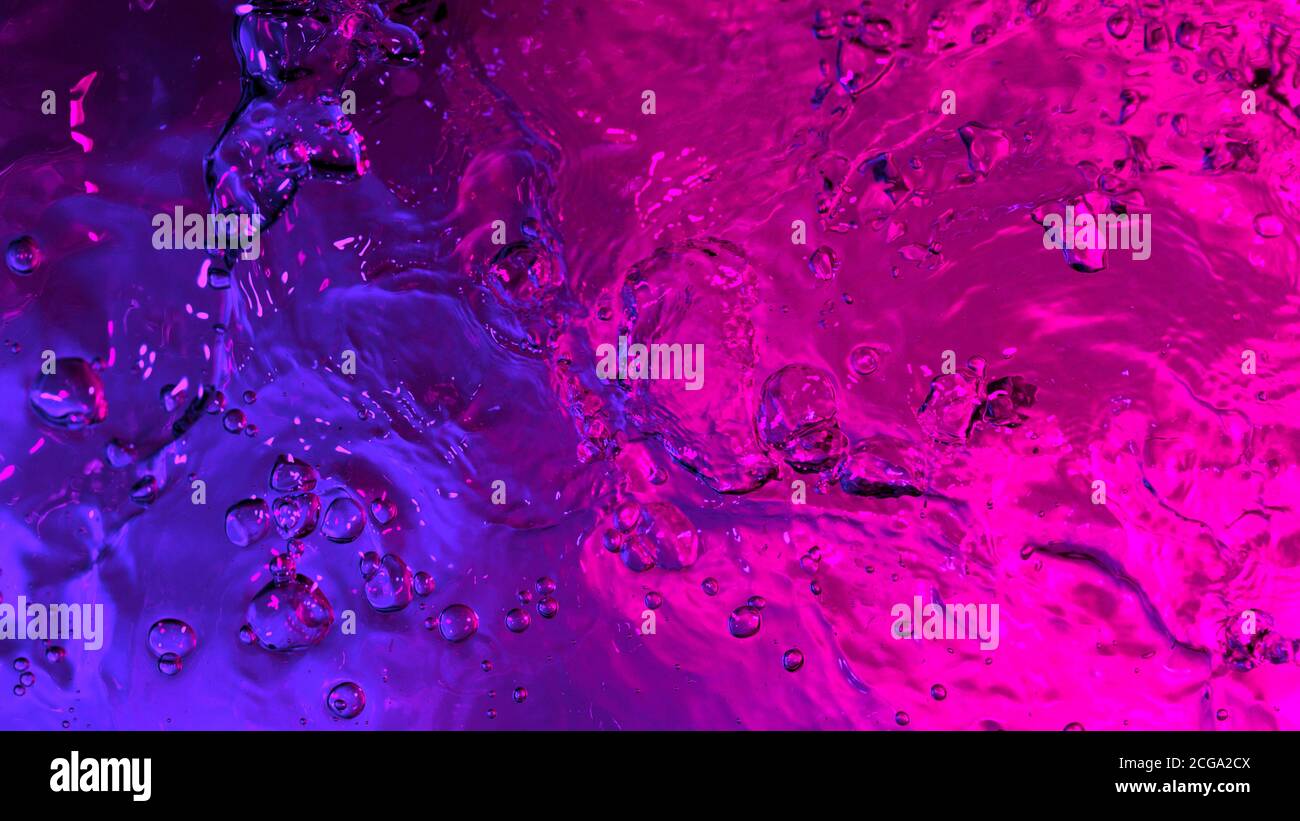 Texture of water illuminated by neon lights, top view Stock Photo - Alamy