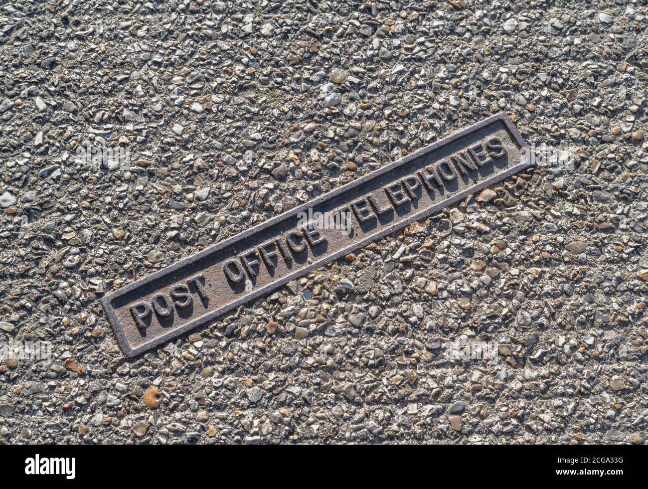 Pathway telephone line inspection cover from the old days when the Post ...
