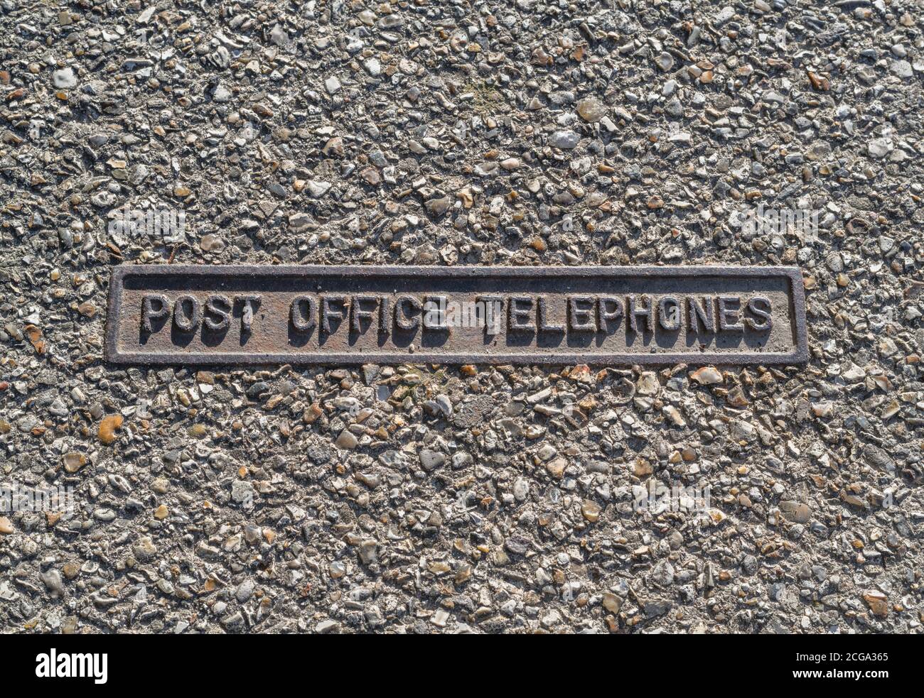 Pathway telephone line inspection cover from the old days when the Post ...