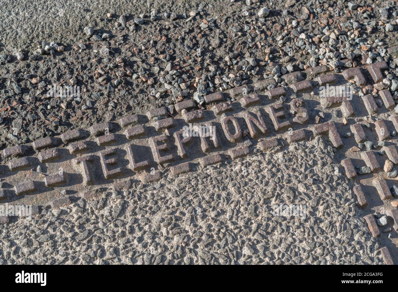 Pathway telephone line inspection cover from the old days when the Post ...