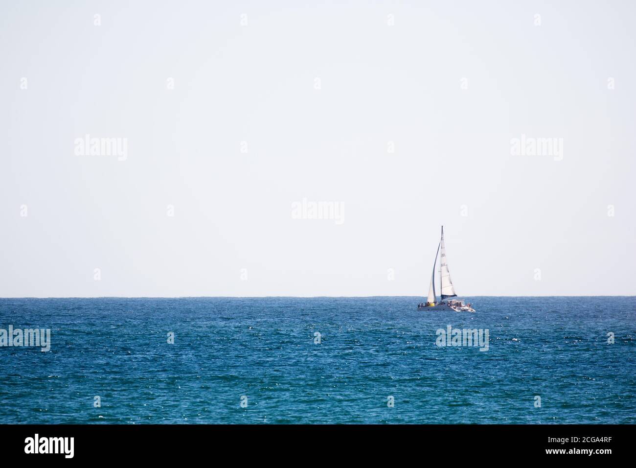 Sailing on the blue sea Stock Photo - Alamy