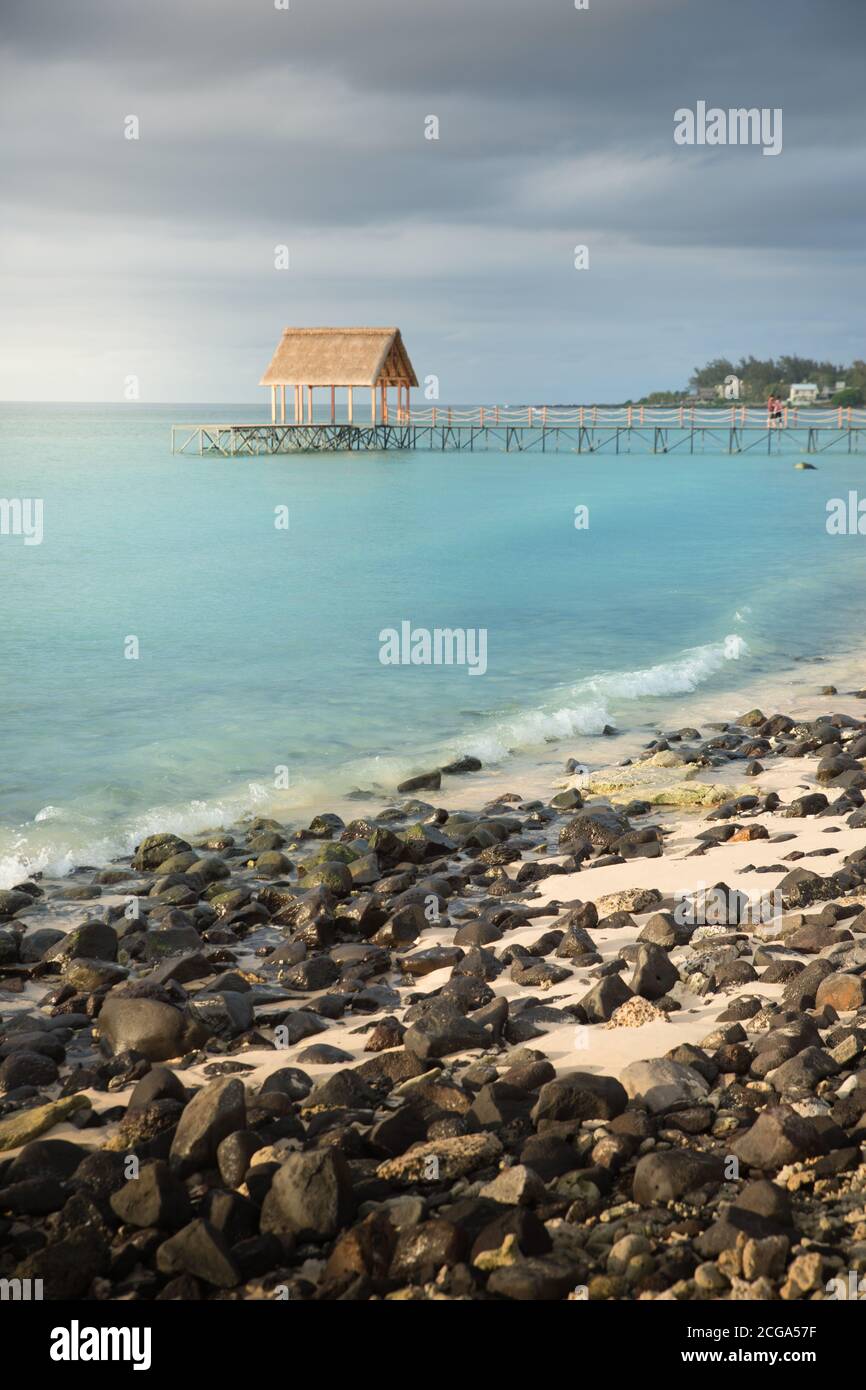 Jetty on aqua colored beach in Mauritius Stock Photo - Alamy