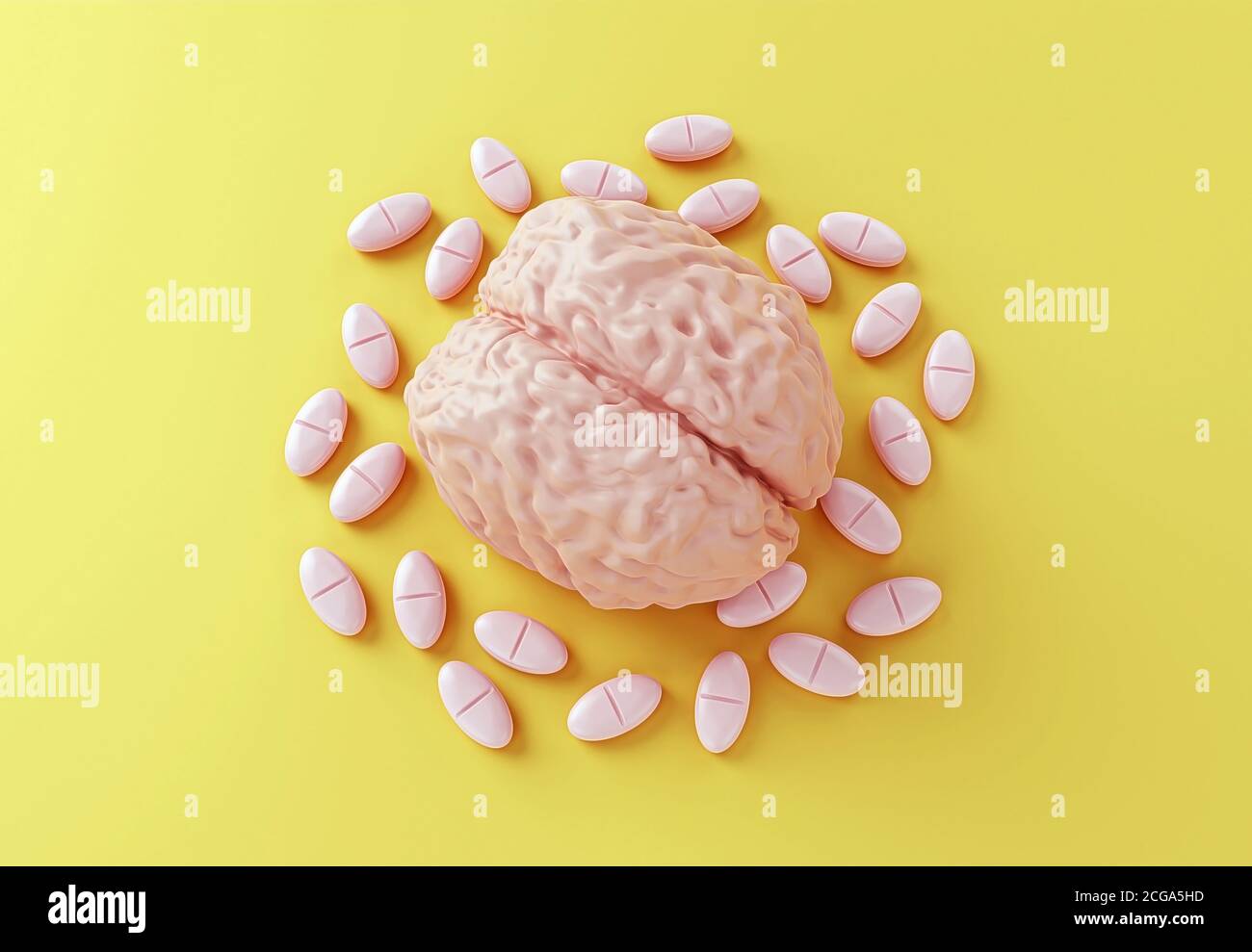 human brain surrounded by pills on yellow background, view from above ...