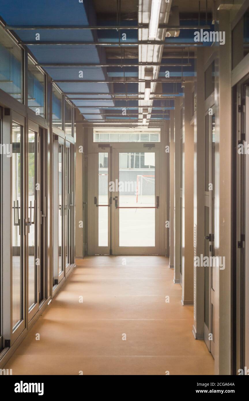 empty school corridor - emergency exit Stock Photo - Alamy