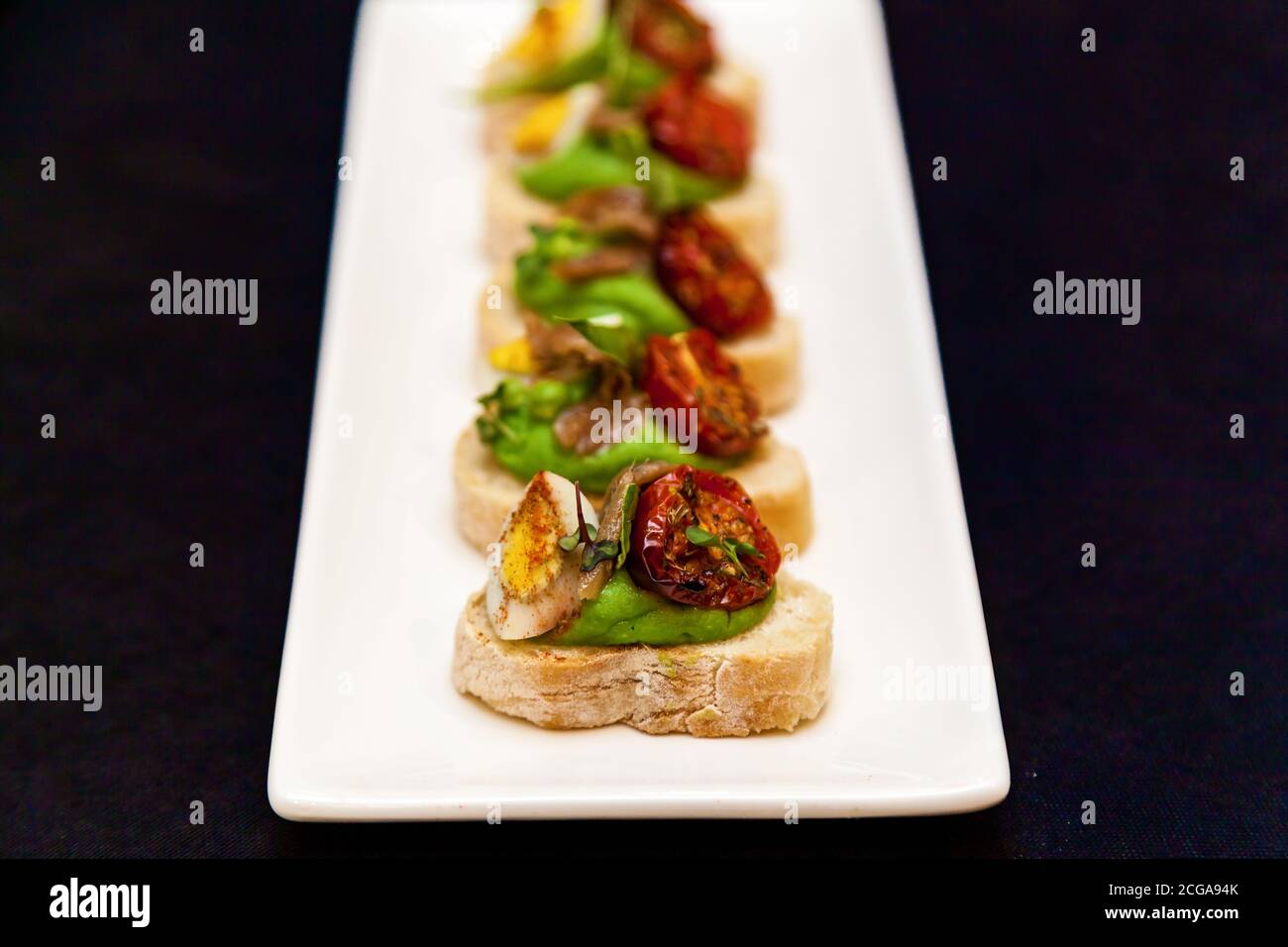 Catering, various delicious snacks on buffet plates. Catering, assorted ...