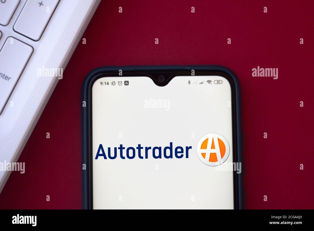 In this photo illustration the Autotrader.com logo displayed on a ...