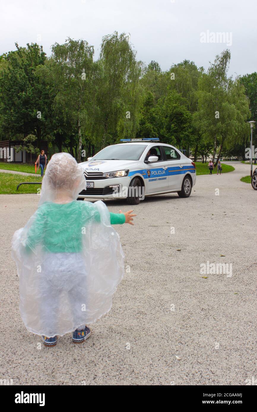A little boy meets a police car Stock Photo - Alamy