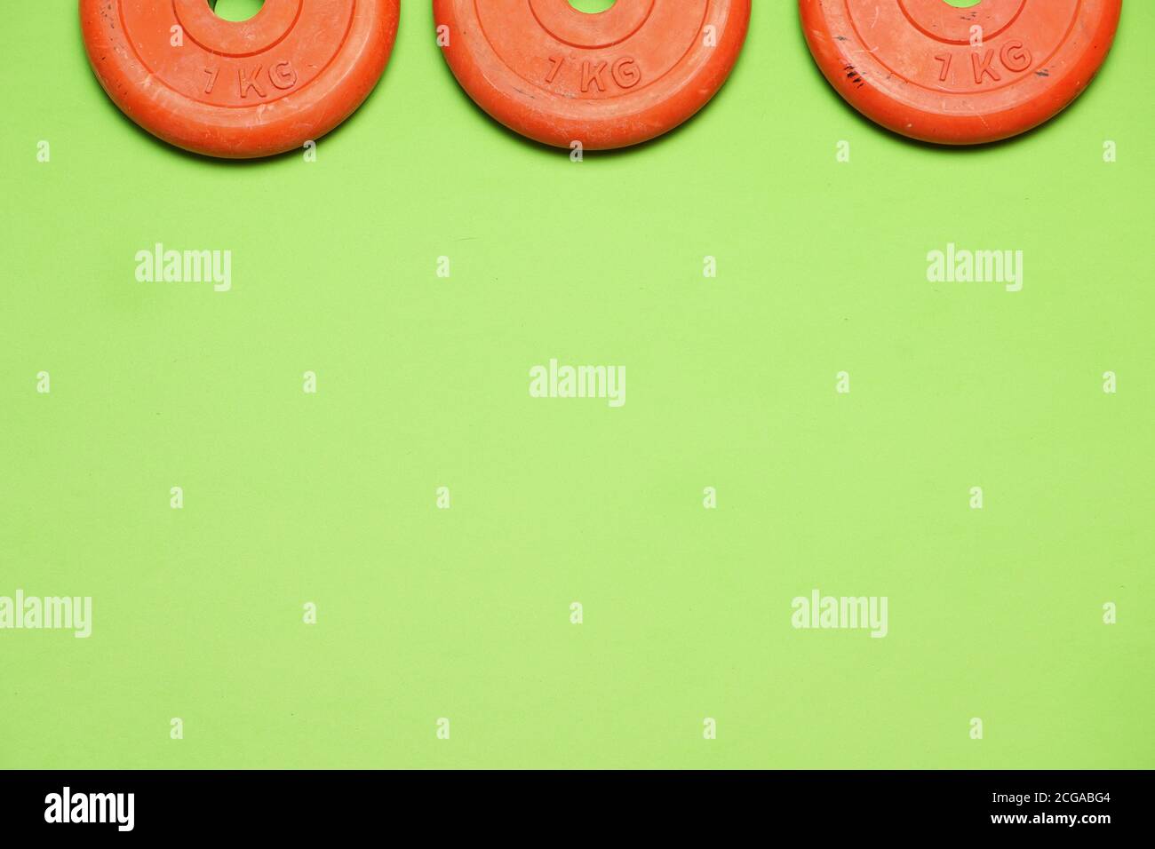 top view of dumbbells on green background. flat lay flat design Stock ...