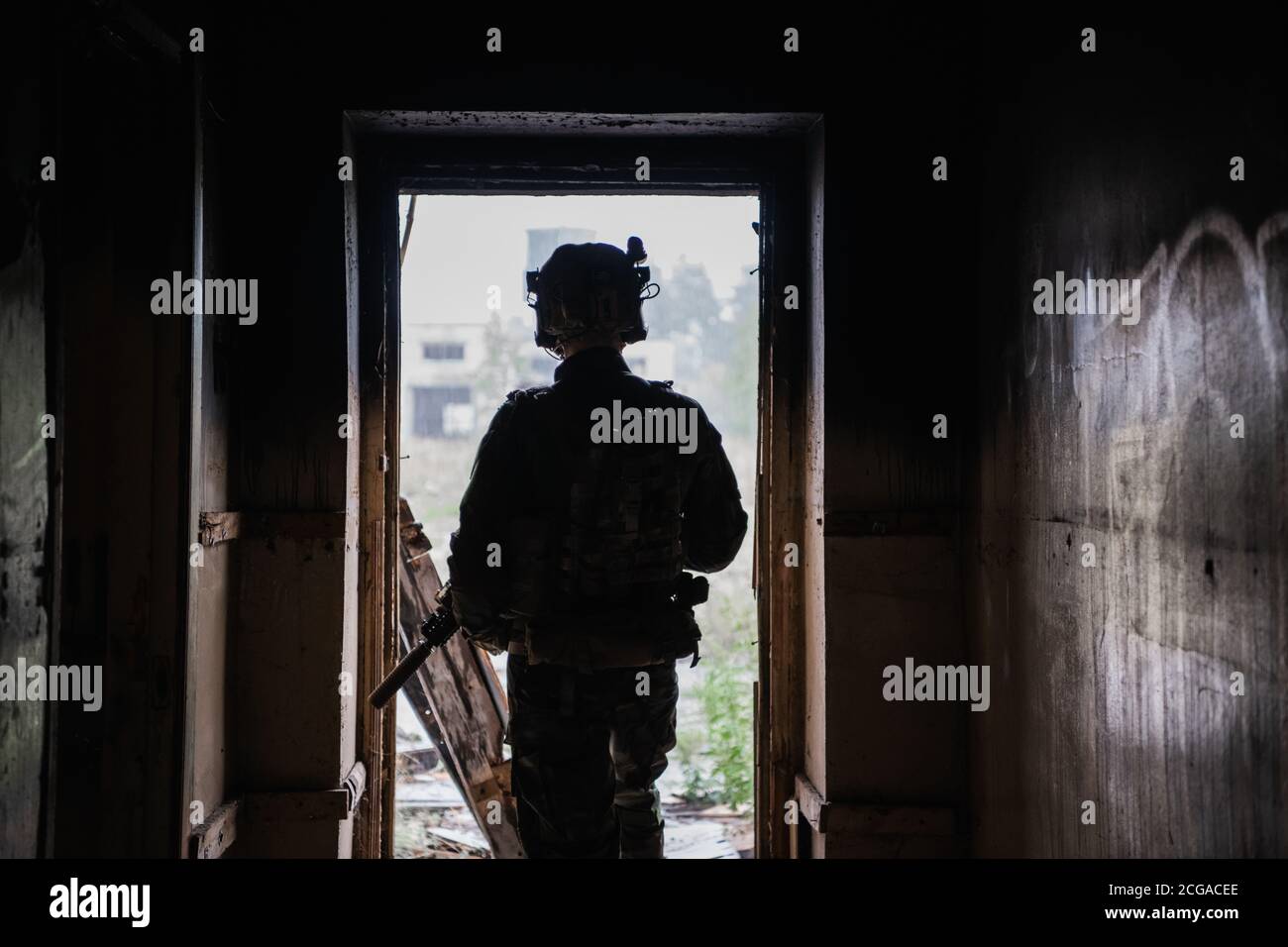 Front view close up of caucasian soldier with a rifle stand guard ...