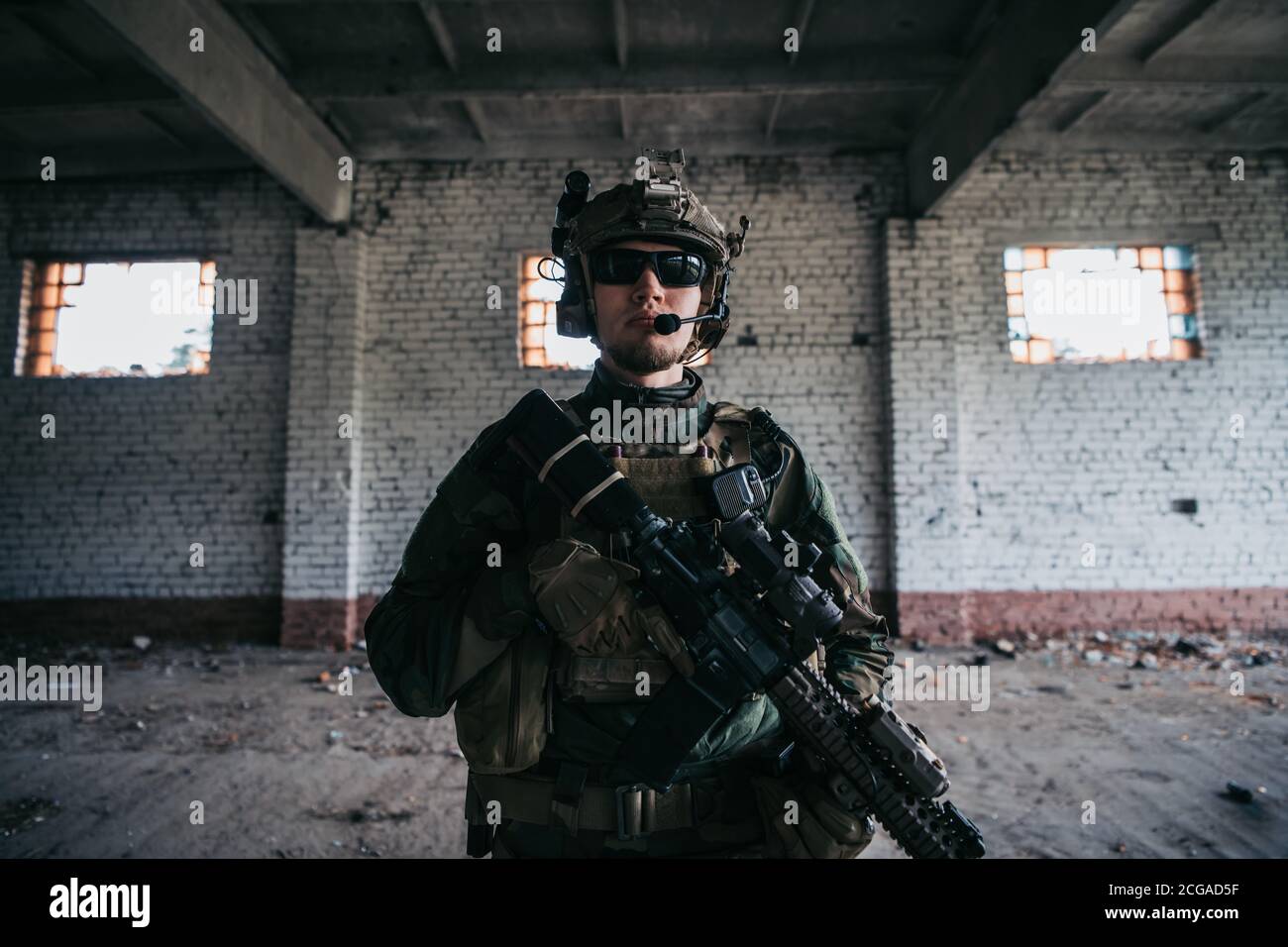 Military men with arms defending the building. Soldier stand guard ...