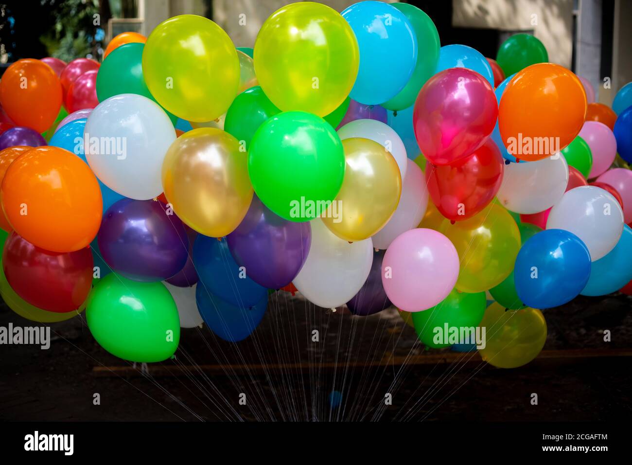 A lot of colorful balloons close-up views. Balloons of many colours ...