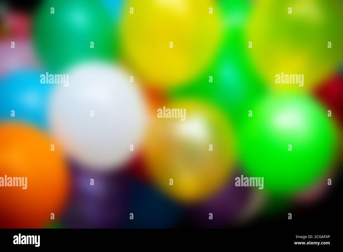A lot of colorful balloons close-up views. Balloons of many colours ...