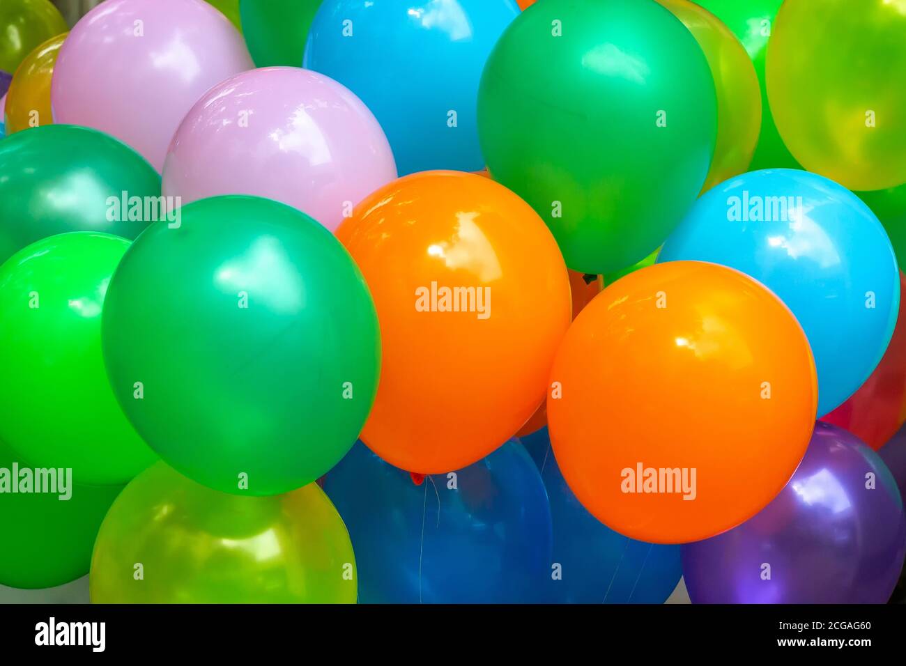 Colorful gas-filled balloons close-up Stock Photo - Alamy