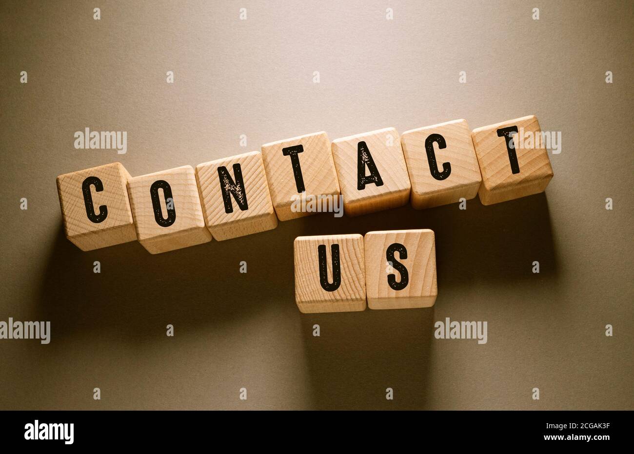 Contact Us Word Written on Wooden Cubes Stock Photo - Alamy