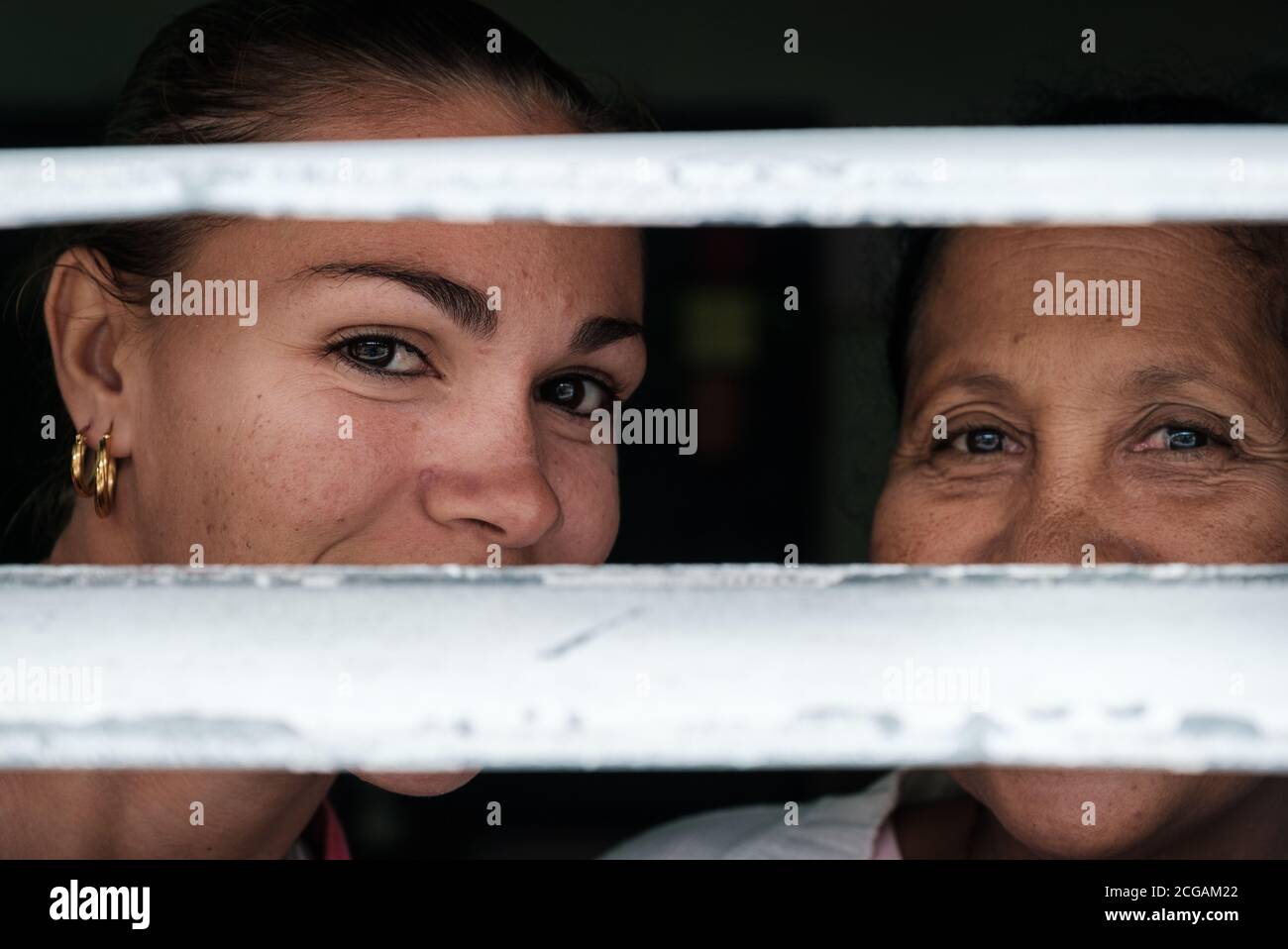 Two women at a window hi-res stock photography and images - Alamy