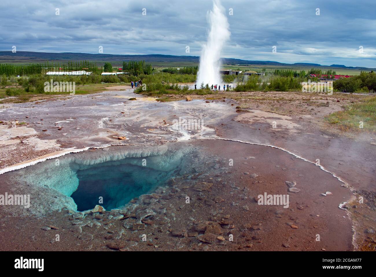 Strokkur geyser during an eruption as seen from in front of the ...