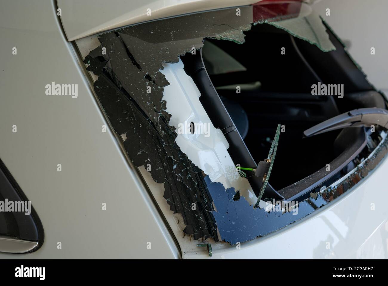 Behind broken glass car damage caused by accident Stock Photo - Alamy