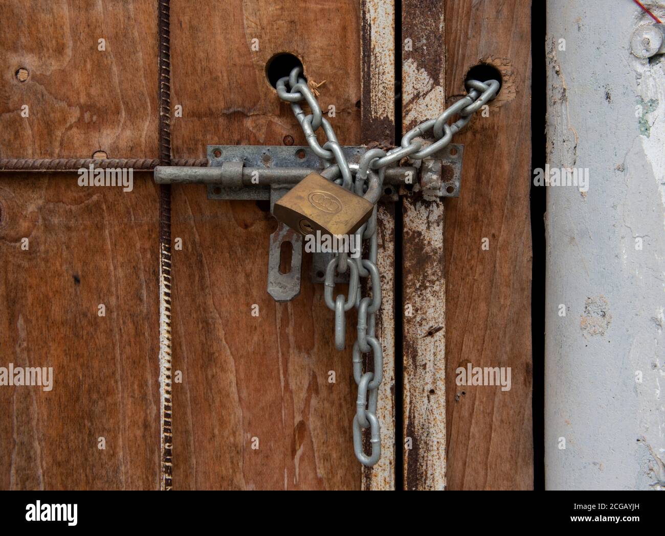 Hong Kong,China:25 Mar,2020. Padlock and chain secures a derelict ...