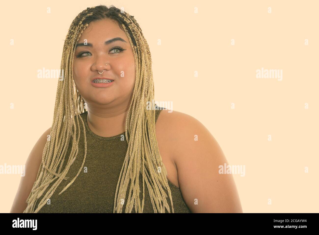 Happy overweight asian woman thinking hi-res stock photography and ...