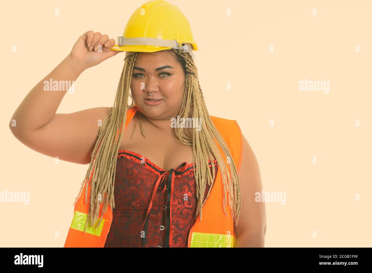 Woman safety vest helmet construction hi-res stock photography and ...