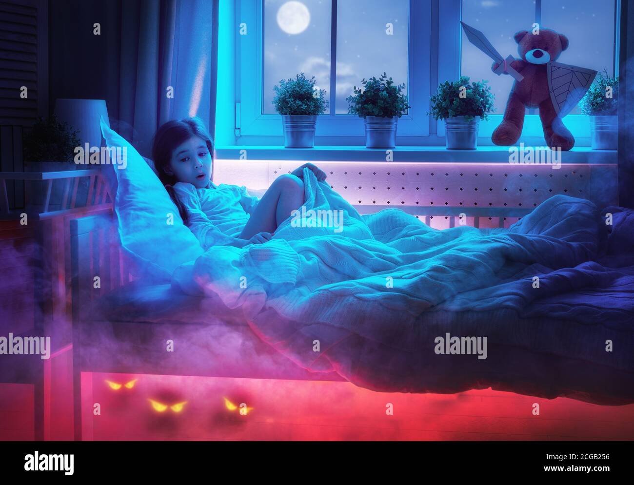 Nightmare for children. Little child girl is afraid of monsters in the ...