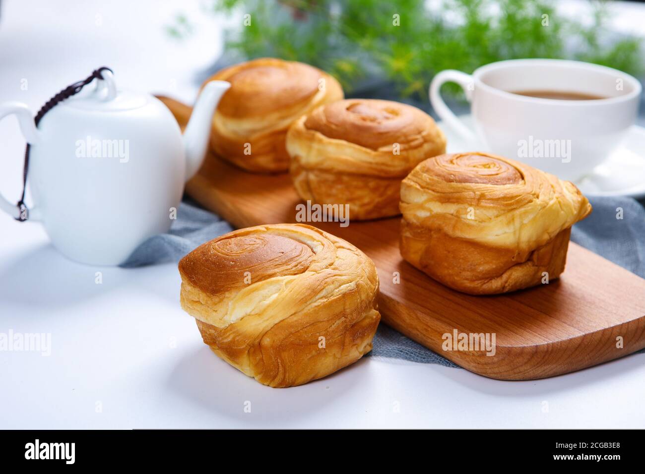 Hand bread delicious afternoon tea Stock Photo - Alamy