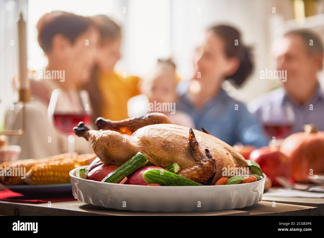 Happy Thanksgiving Day! Autumn feast. Family sitting at the table and ...