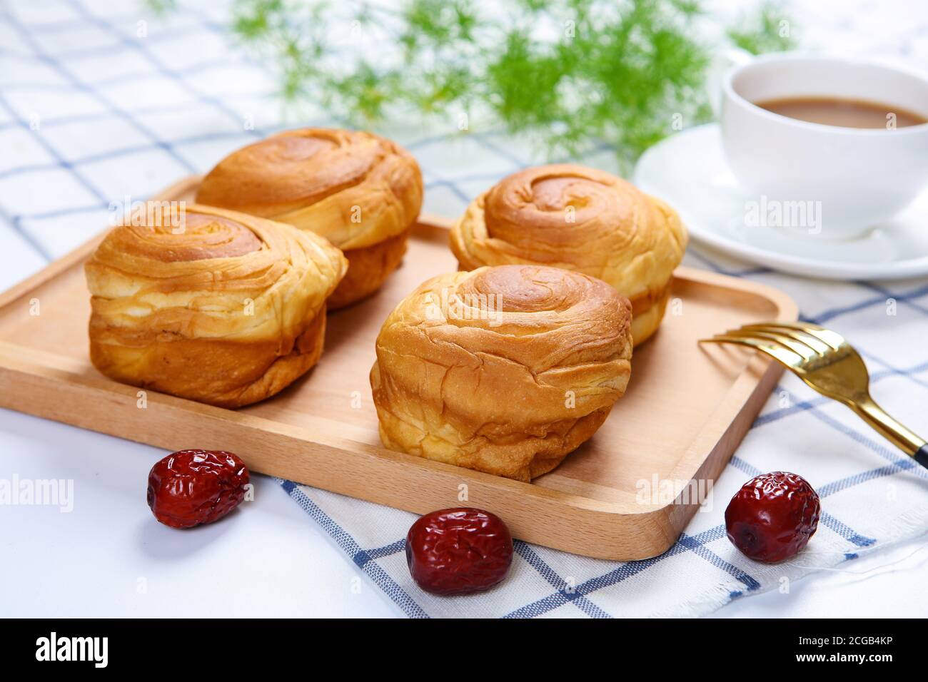 Hand bread delicious afternoon tea Stock Photo - Alamy