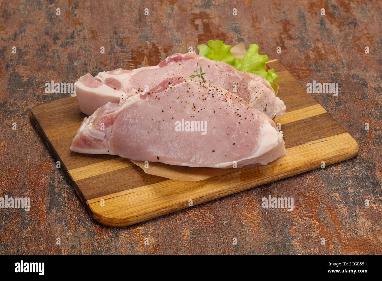 Raw pork meat steak ready for grill Stock Photo - Alamy