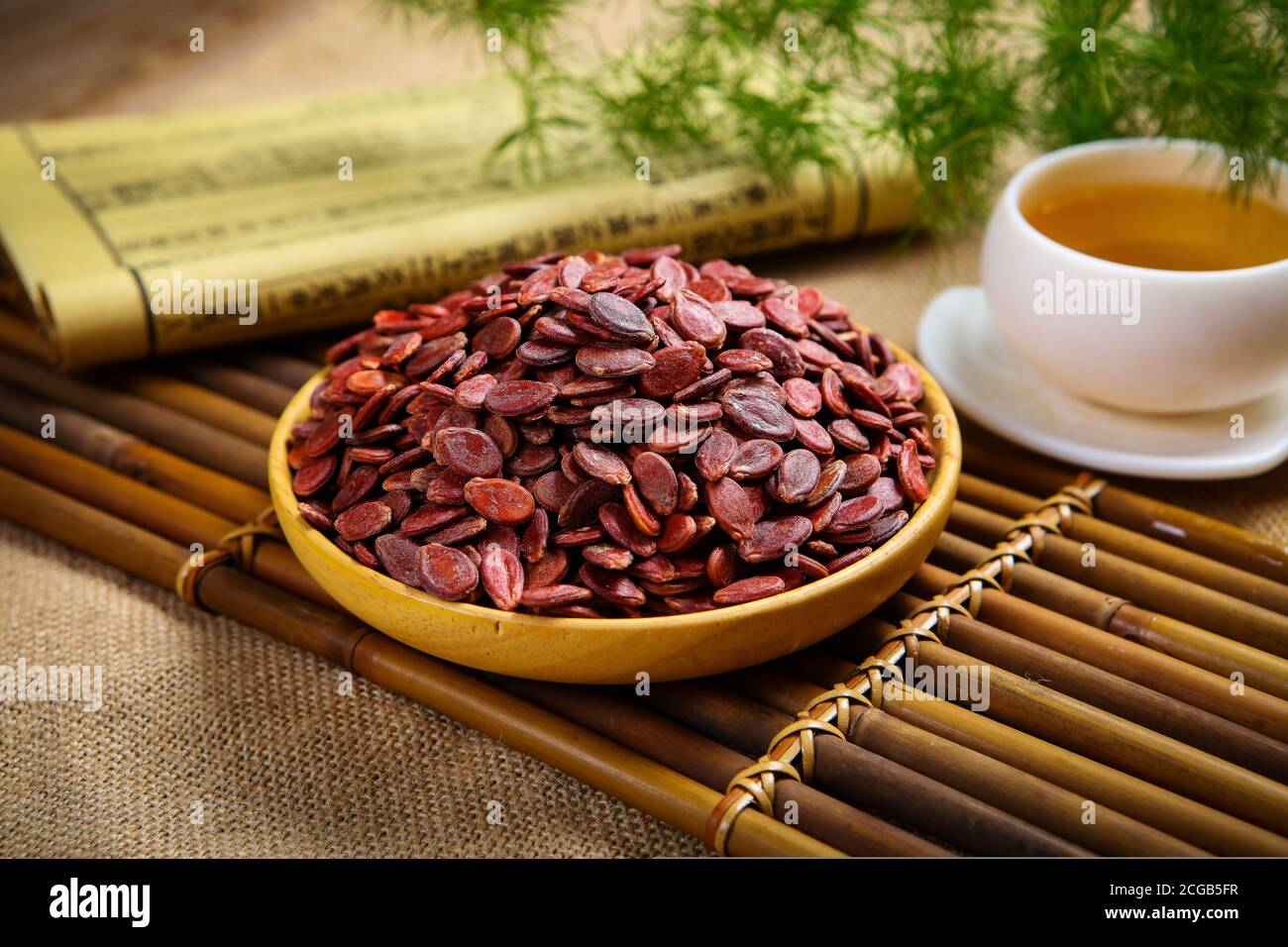Red melon seeds Stock Photo - Alamy