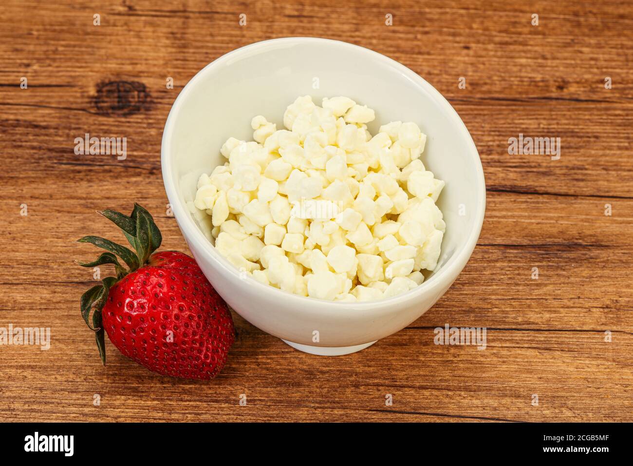Dietary food - grain cottage cheese in the bowl Stock Photo - Alamy