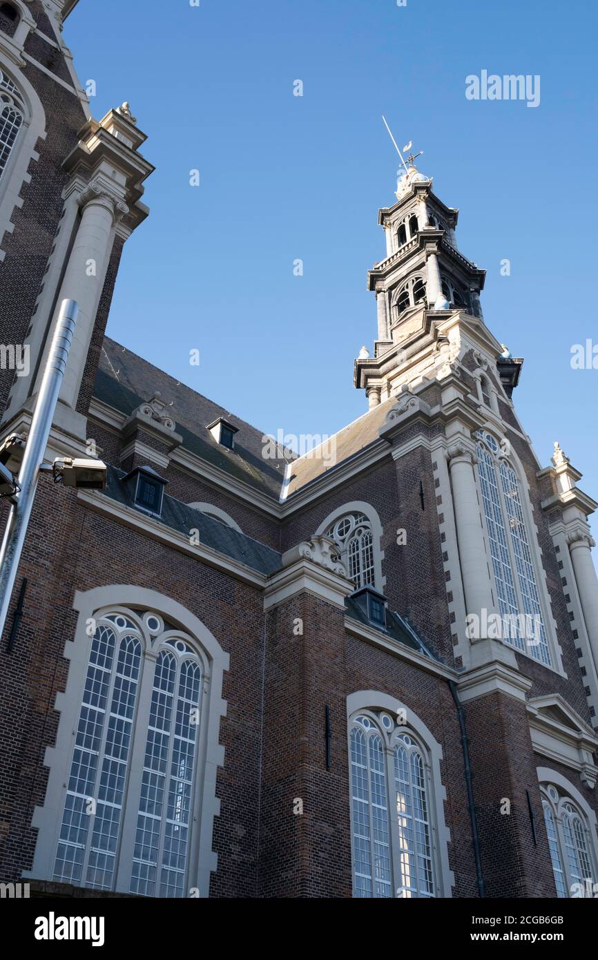 Facade of famous Westerkerk church on the Prinsengracht in the ...