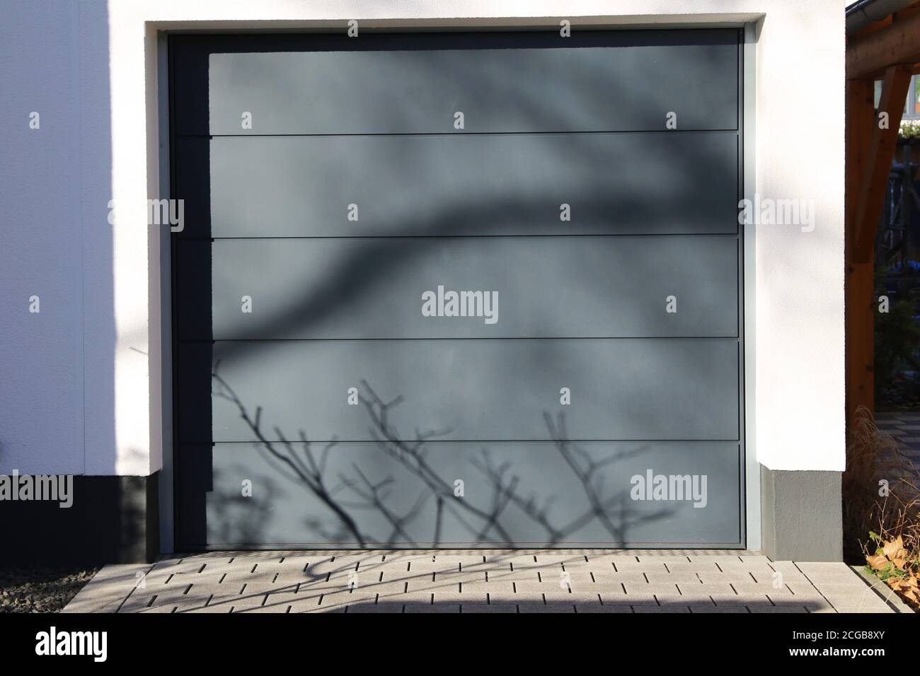 Modern new garage door (sectional door Stock Photo - Alamy