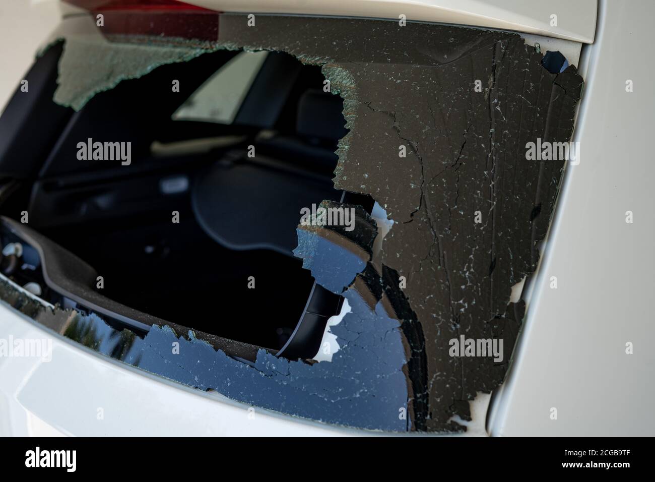 Behind broken glass car damage caused by accident Stock Photo - Alamy