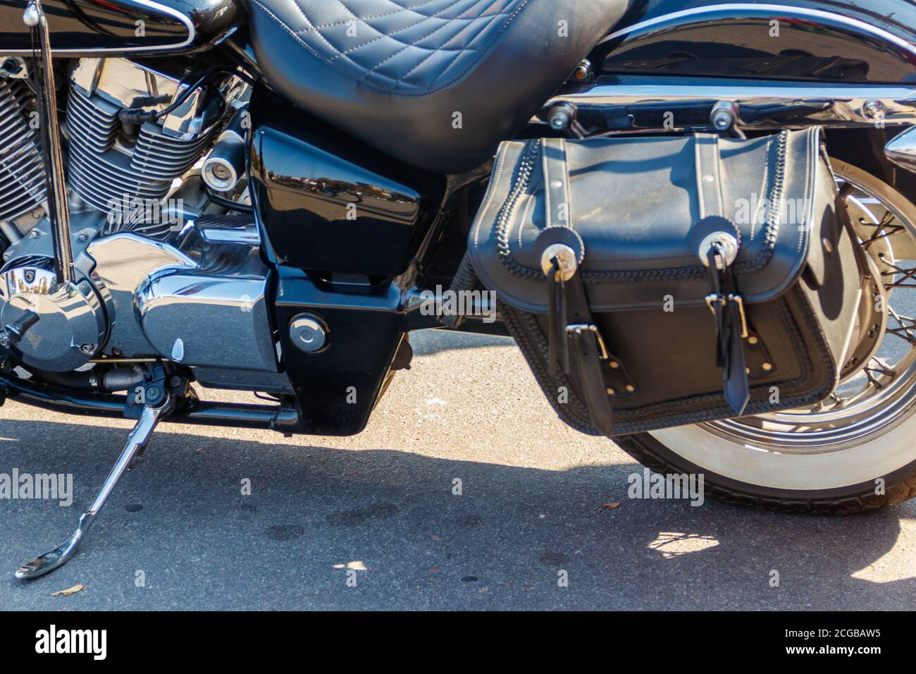Leather biker bag on a motorcycle close-up. Concept travel on a ...