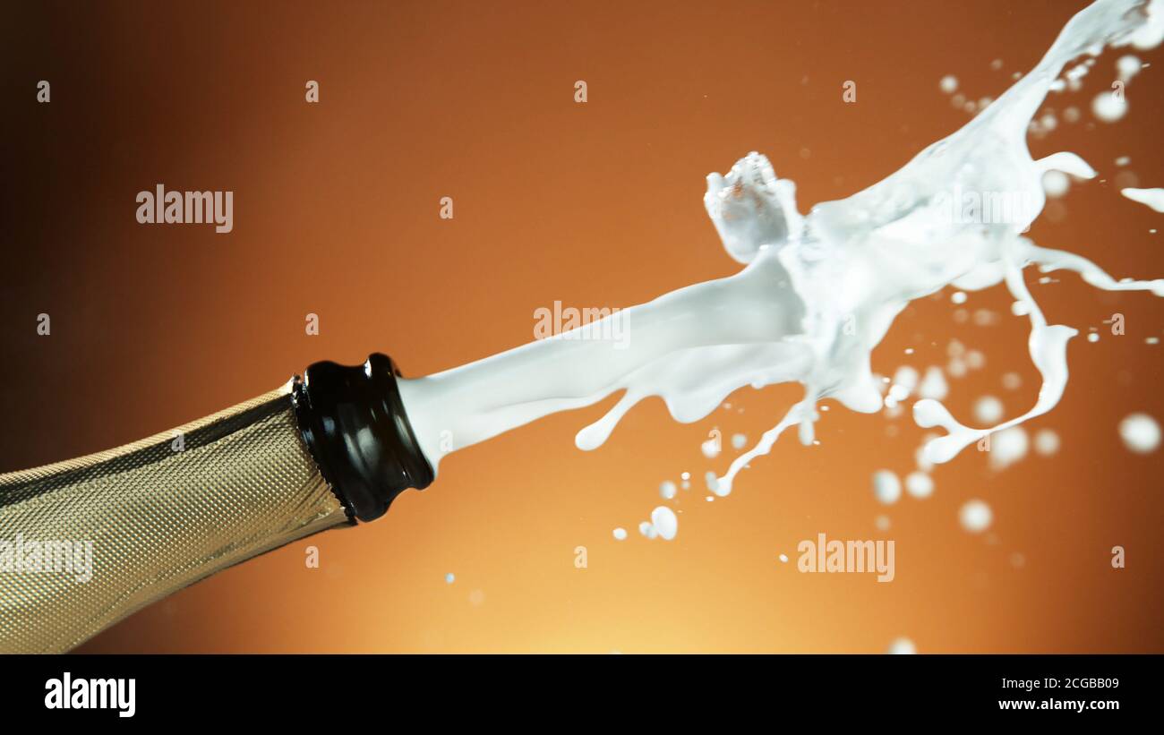 Splashing champagne wine from bottle, celebration still life, New Year ...