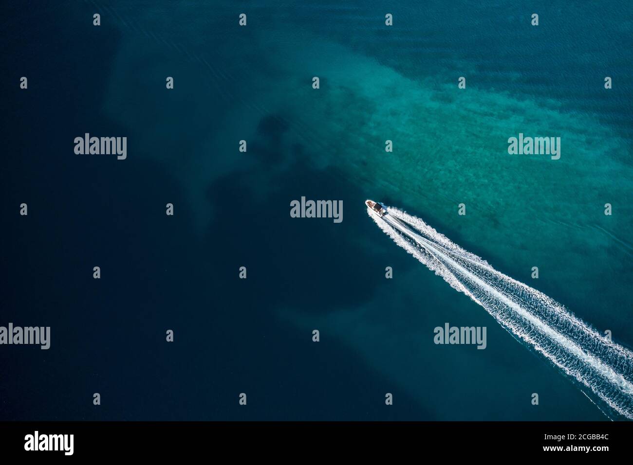 Aerial view of speed motor boat in shallow water. Travel and leasure ...