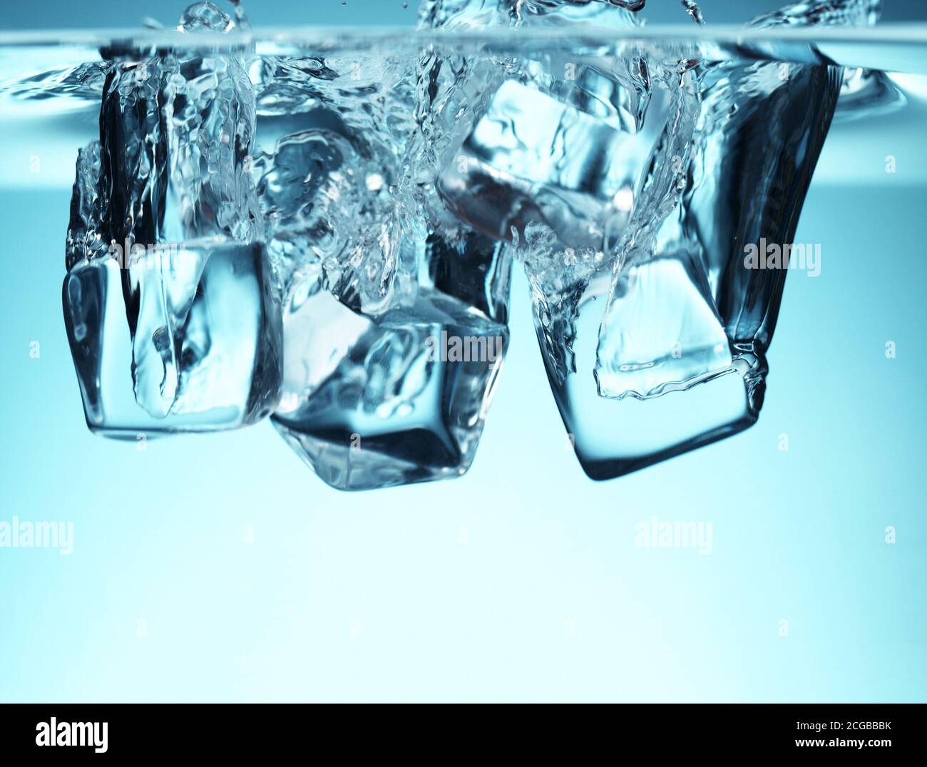 Group of ice cubes falling in water. Refreshment and drink concept ...