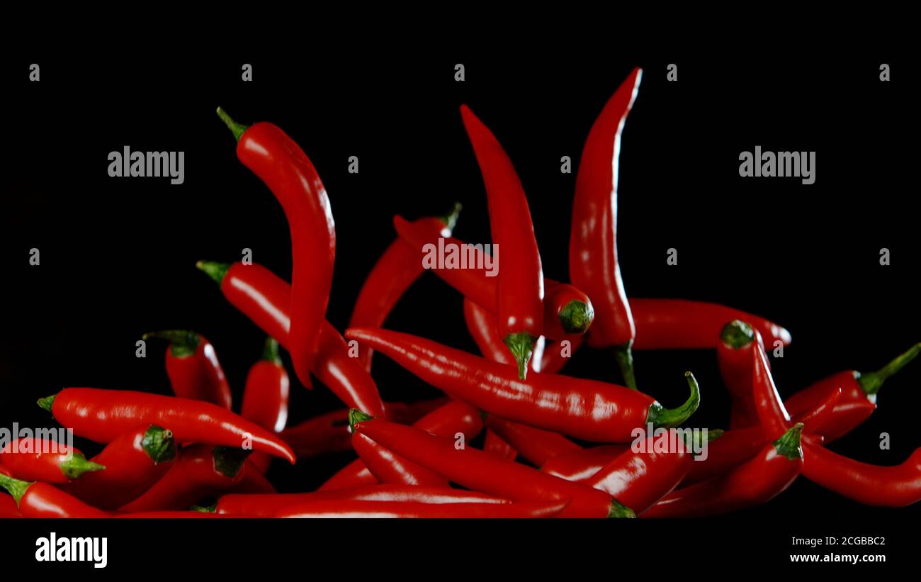Flying red hot chilli hi-res stock photography and images - Alamy