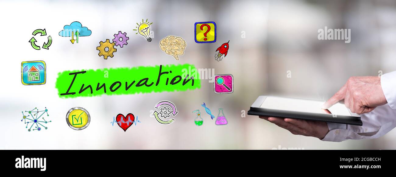 Man using a tablet with innovation concept Stock Photo - Alamy