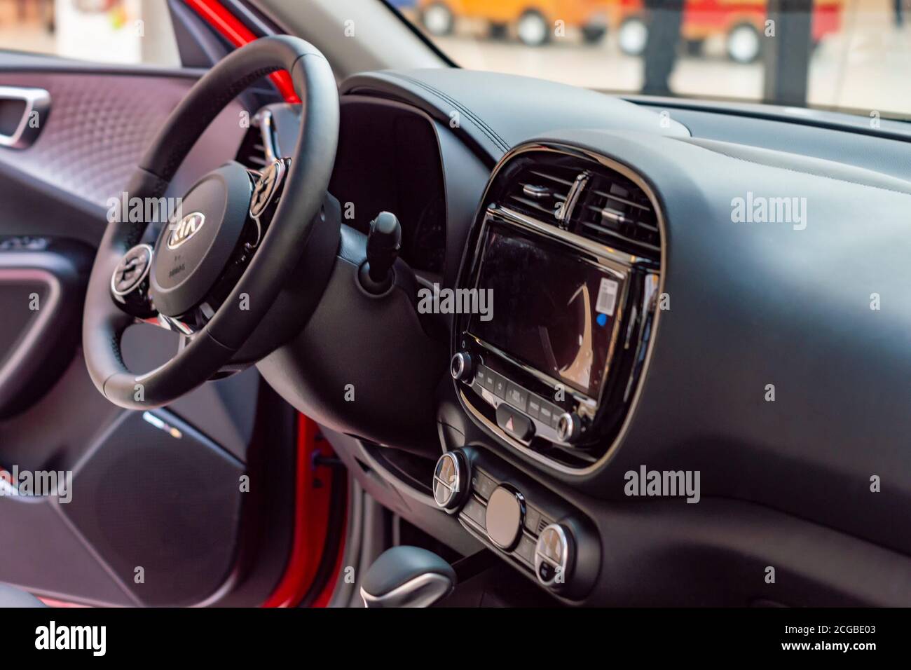Front panel, steering wheel, car red Side view Stock Photo - Alamy