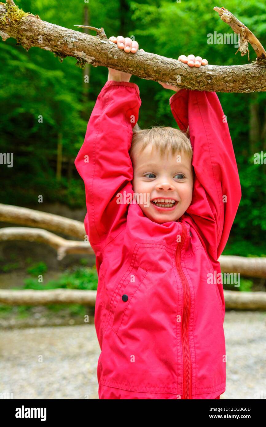 Young boy has fun during adventure hike in canyon Stock Photo - Alamy