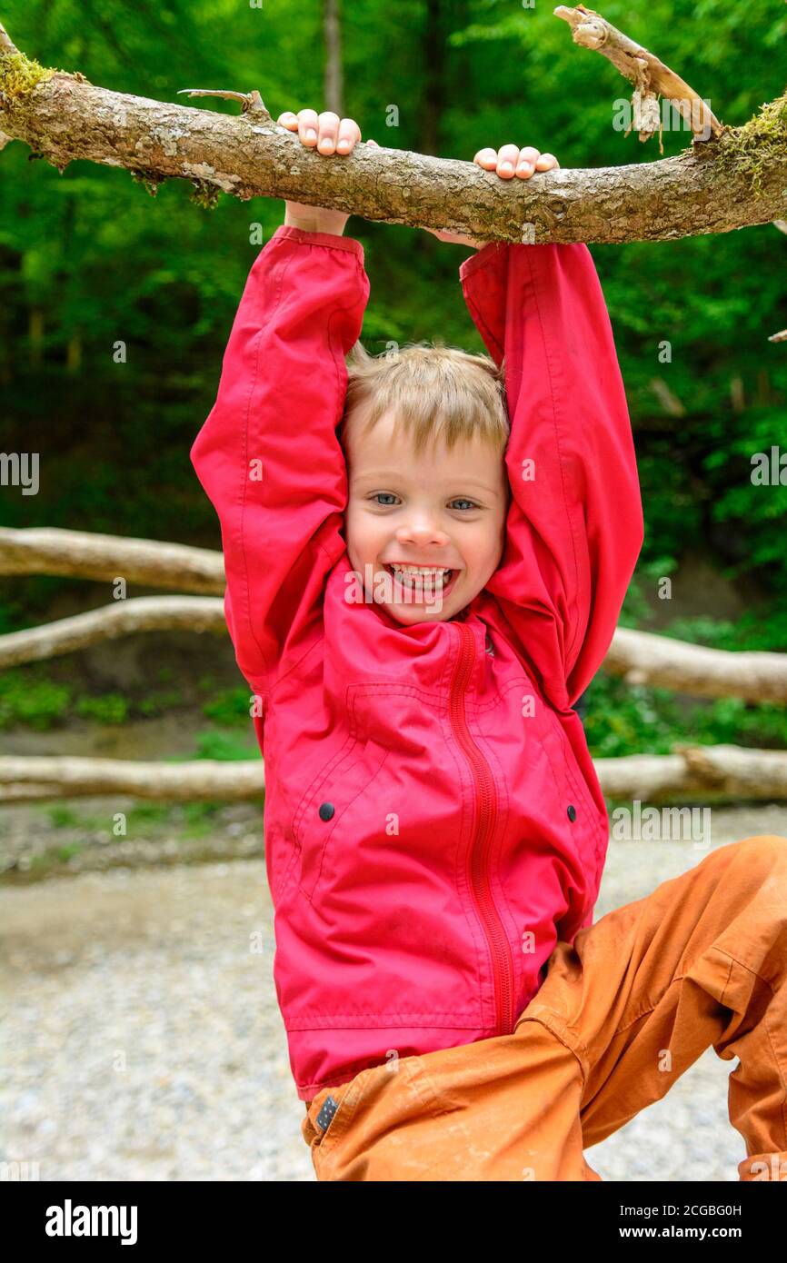Young boy has fun during adventure hike in canyon Stock Photo - Alamy