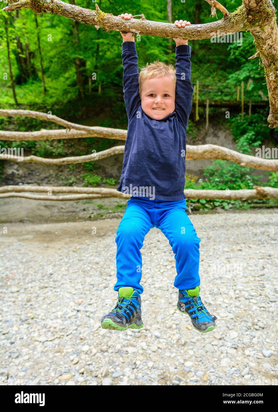 Young boy has fun during adventure hike in canyon Stock Photo - Alamy